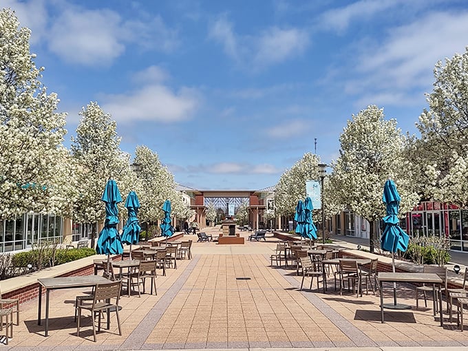 Outdoor dining areas provide perfect rest stops between shopping marathons, complete with comfortable seating arrangements.