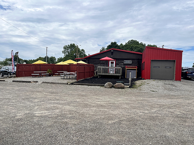 The outdoor seating area, with its cheerful yellow umbrellas, offers a perfect spot to enjoy your BBQ while contemplating a second helping.