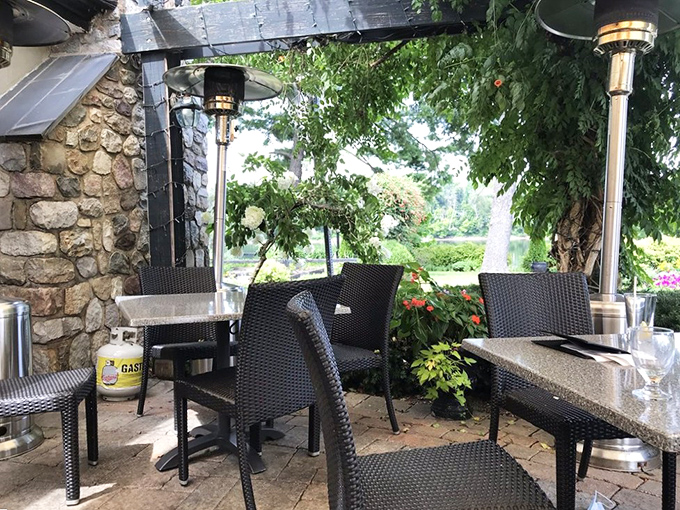 The outdoor patio offers nature's soundtrack with your meal &ndash; dappled sunlight filtering through leaves as you savor each bite.