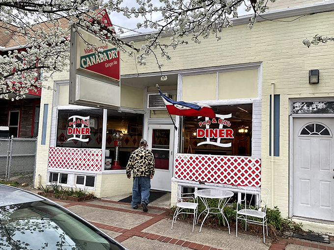Spring blossoms frame the entrance to this community cornerstone, where outdoor seating waits for those perfect Pennsylvania mornings.