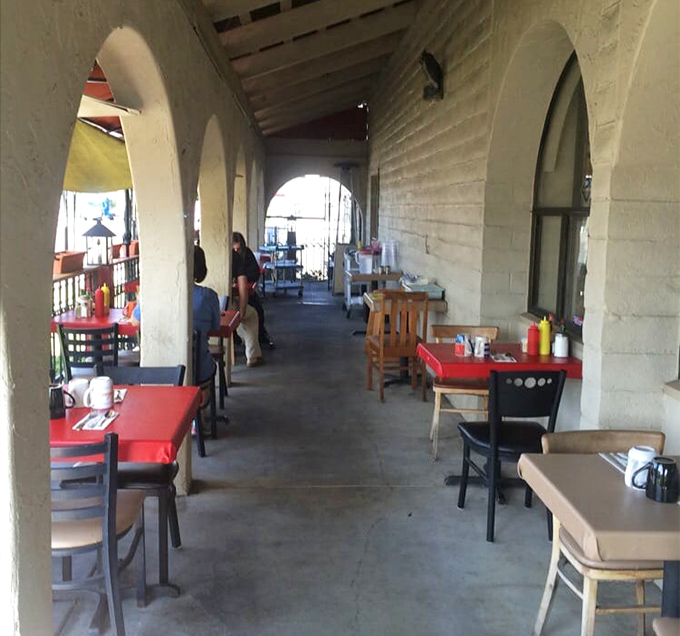 Outdoor seating under the arches offers California sunshine with your eggs&mdash;nature's perfect garnish.