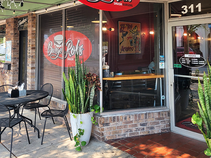 The entrance says it all&mdash;unpretentious, welcoming, and promising something special inside. Those plants add a touch of Florida greenery.