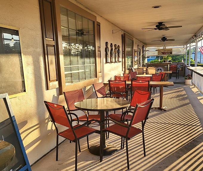Outdoor seating offers a sun-dappled alternative for those who prefer their steak with a side of fresh air.