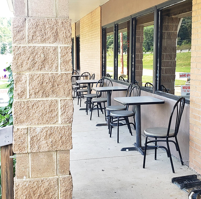 Outdoor seating for when your food coma requires fresh air. These tables have witnessed countless post-breakfast satisfaction sighs.