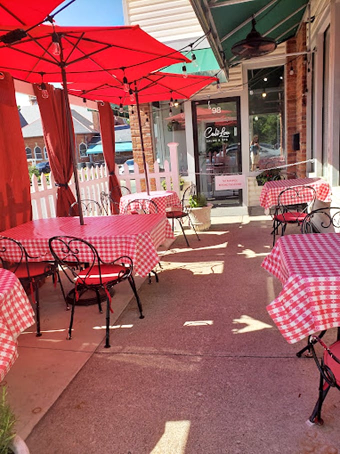 Red umbrellas and checkered tablecloths turn sidewalk dining into an Italian street fair minus the airfare.