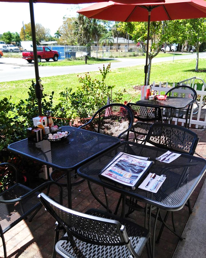 The outdoor seating area offers a peaceful spot to enjoy your breakfast with a side of Florida sunshine. The newspaper is optional, but recommended.