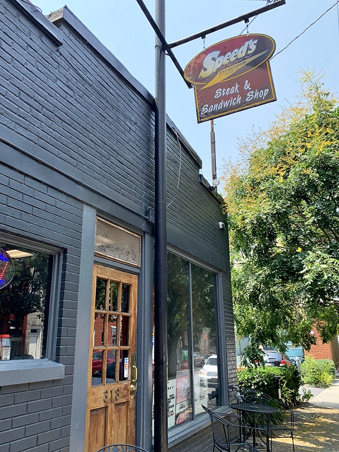 The modest storefront belies the culinary treasures within. That vintage sign promises exactly what Speed's delivers&mdash;excellent steaks and sandwiches.