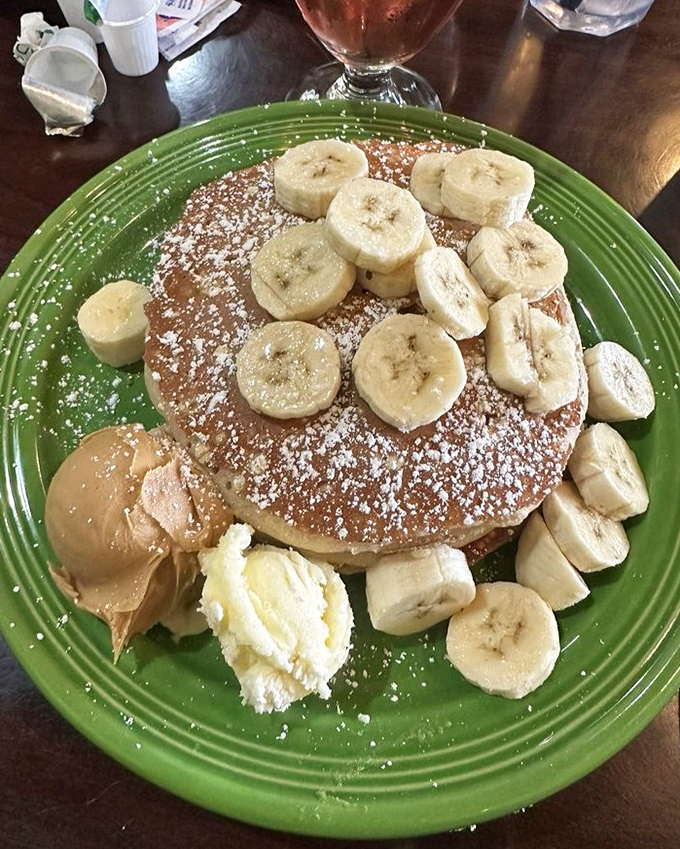 Pancakes that make you want to write poetry. The bananas and powdered sugar aren't just toppings&mdash;they're exclamation points at the end of a delicious sentence.