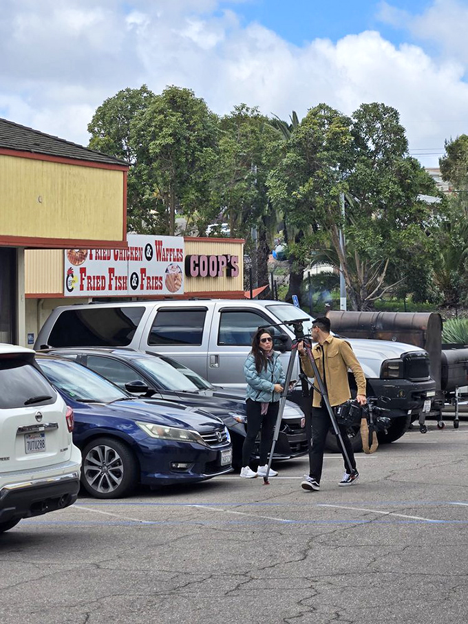 The parking lot&mdash;where anticipation begins and satisfied customers waddle back to their cars in a post-barbecue daze.