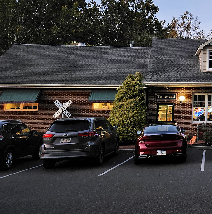 As evening approaches, the warm glow from Moccia's windows beckons hungry travelers like a lighthouse for the famished.