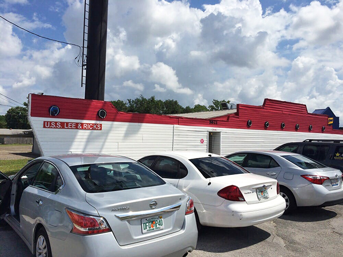 The parking lot view reveals the truth&mdash;this unassuming vessel-shaped building draws a loyal fleet of cars filled with people who know where real flavor docks.