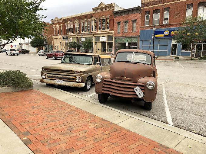 Even the vintage trucks parked outside seem to have stories to tell. In Omaha, even the parking has personality.