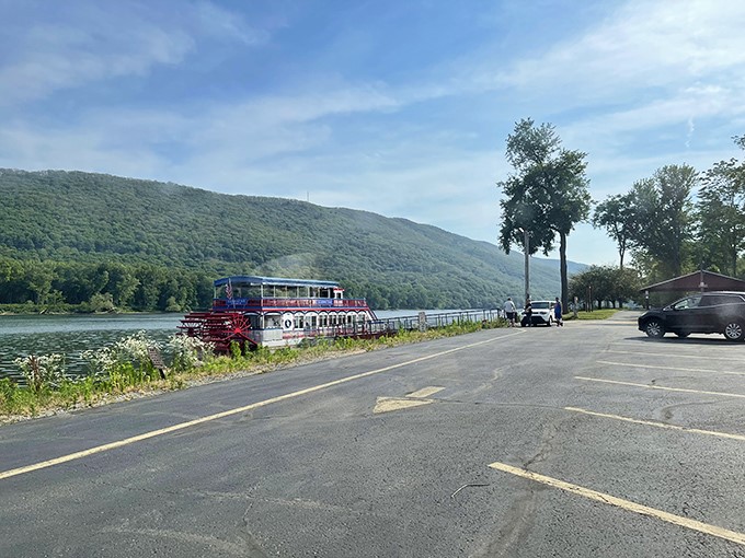 The paddlewheel boat waits patiently by the shore, promising adventures that don't require downloading an app or charging a battery.