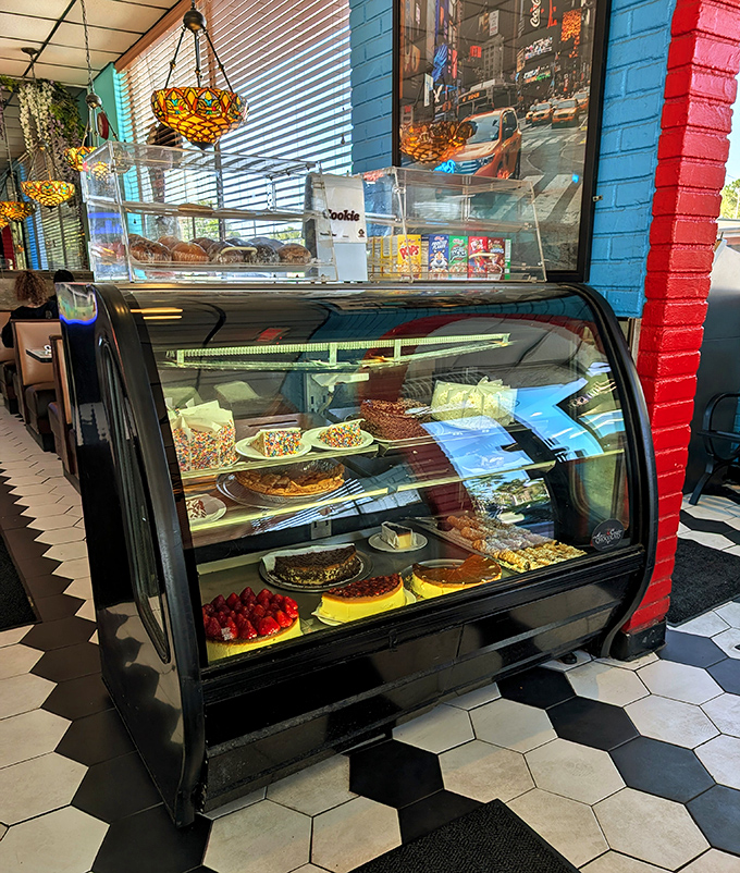 The dessert case &ndash; where willpower goes to surrender. Each shelf a different chapter in the story of "I shouldn't, but I will."