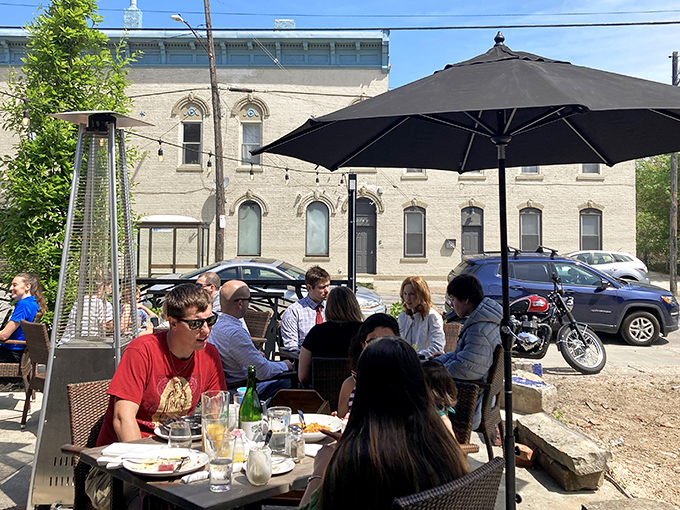 Al fresco dining where the neighborhood charm becomes part of your meal's ambiance and overall dining experience.