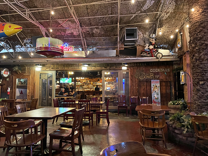 The spacious interior reveals multiple dining areas, with a mezzanine that offers a bird's-eye view of this culinary corral.