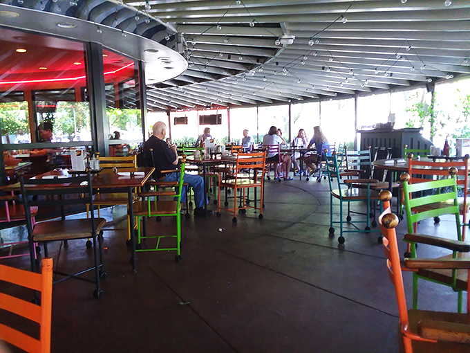 The outdoor patio with its colorful chairs feels like dining in a Crayola box &ndash; a cheerful spot to people-watch while your milkshake melts.