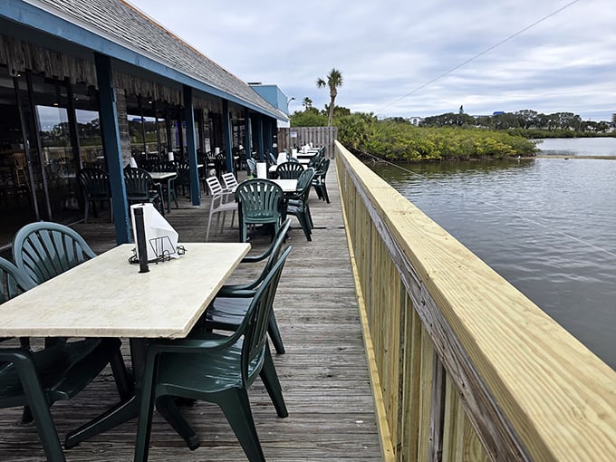 The outdoor deck&mdash;where the restaurant's name makes perfect sense&mdash;offers waterfront dining without the waterfront prices. Those plastic chairs have witnessed countless sunset toasts.