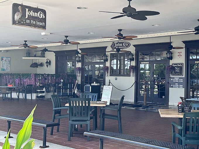 The outdoor seating area whispers, "Stay awhile." Even the pelican statue seems to be saying, "Trust me, the fish here is fantastic."