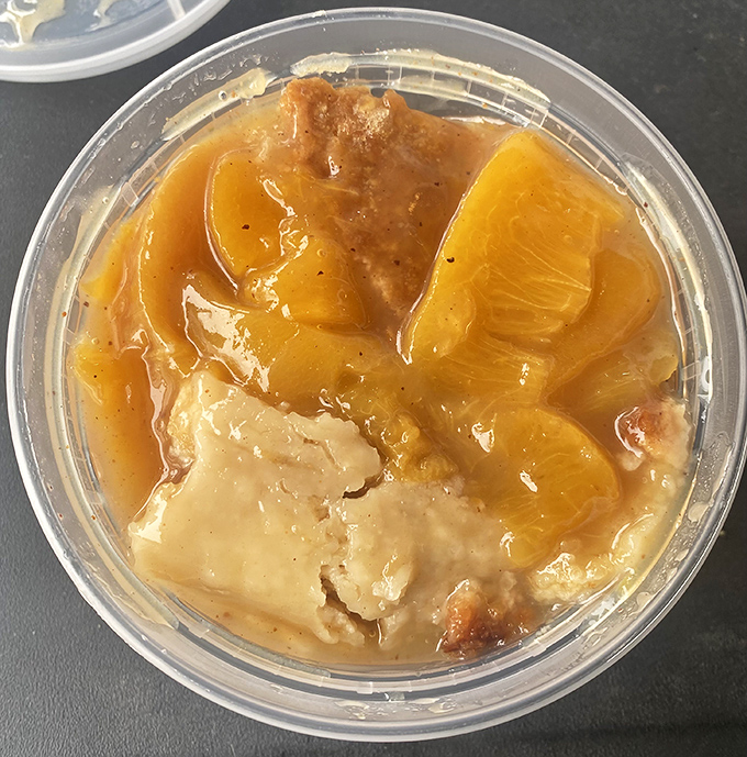 Peach cobbler that captures Georgia sunshine in every spoonful. The perfect marriage of fruit and buttery crust that demands a moment of silence.