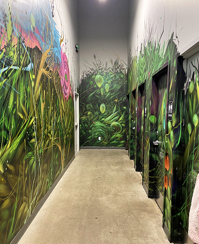 Even the hallways refuse to be ordinary, with plant-life murals that seem to grow more vivid the longer you stare.