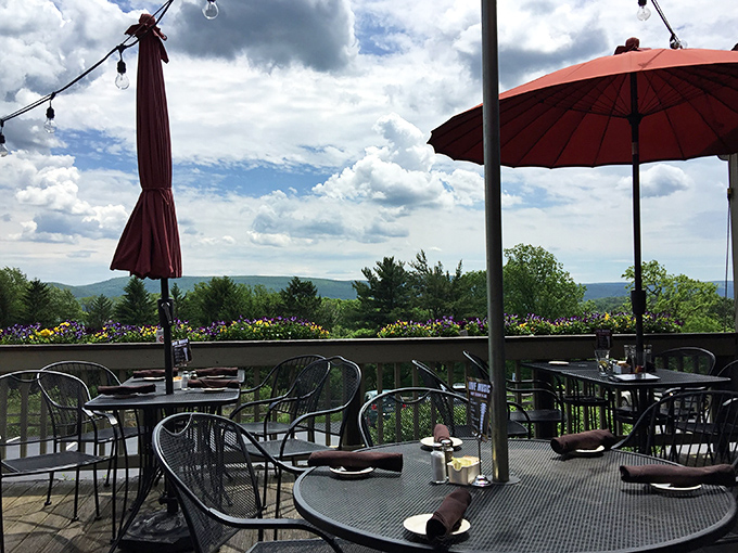 Dining on the deck means your meal comes with a side of Laurel Highlands panorama&mdash;nature's own dinner theater without the overpriced tickets.