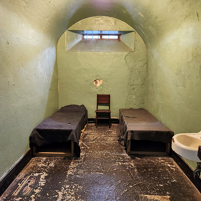 Two sparse prison beds with thin mattresses make today's complaints about hotel accommodations seem rather trivial by comparison.