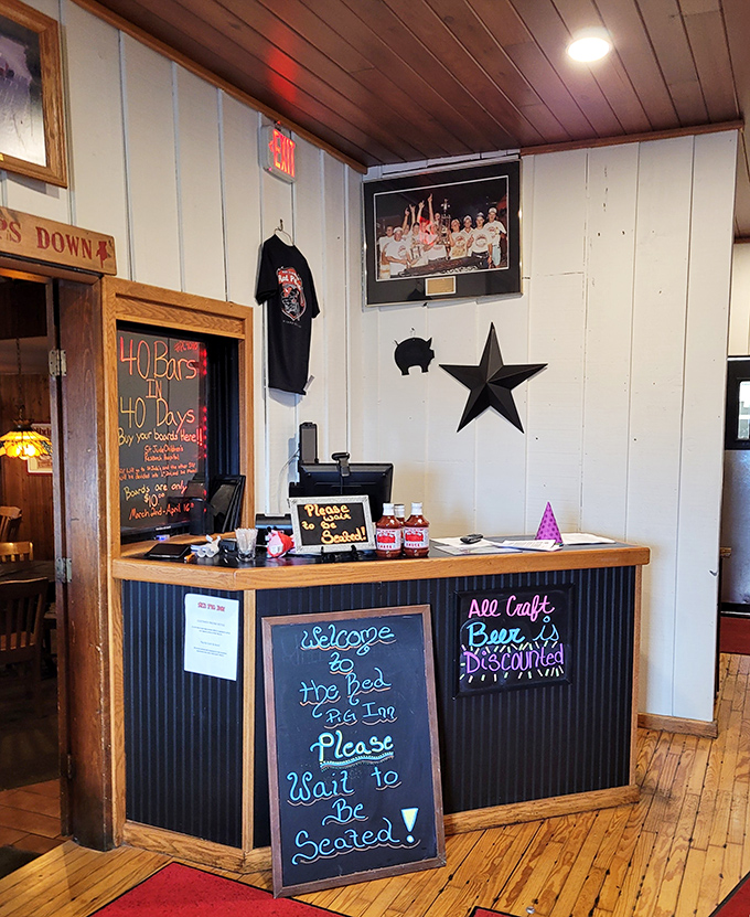 The host stand's chalkboard welcome feels like a friend's invitation to dinner. That "Please Wait to Be Seated" isn't just policy&mdash;it's a promise of good things to come.