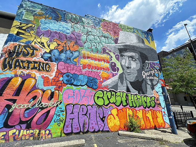 Sunshine makes the mural pop with even more vibrant energy. "Just Waiting" indeed&mdash;for you to come experience this Canton institution.