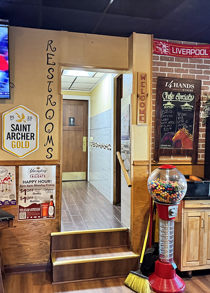 The path to the restrooms—a journey every burger enthusiast eventually makes. That Liverpool sign suggests even the Beatles would approve.