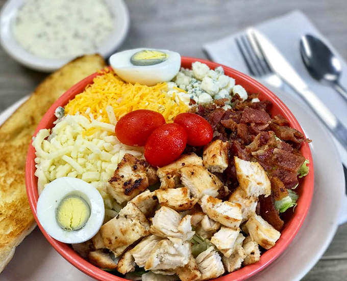 This isn't just a salad—it's a protein party in a bowl where chicken, bacon, and eggs are the VIP guests.