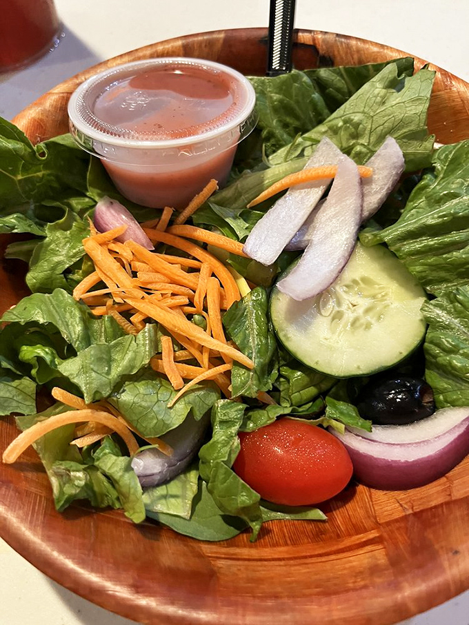 Fresh greens providing the perfect intermission between acts of this seafood symphony performance.