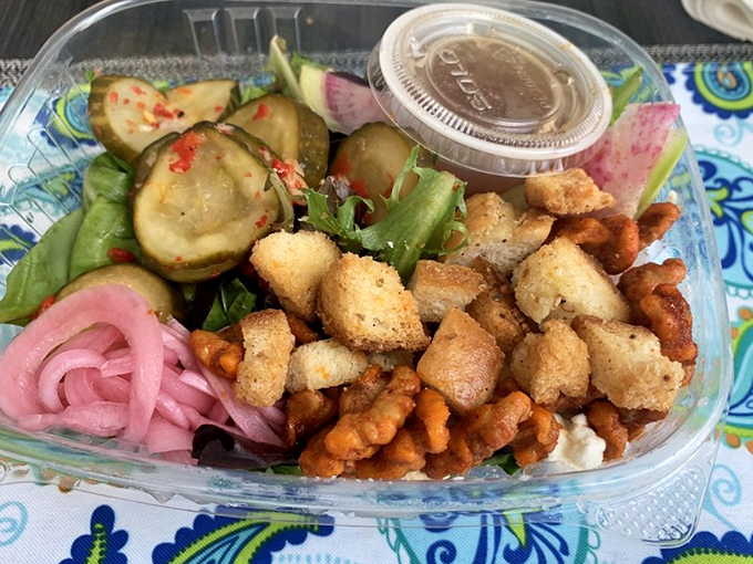 A salad that doesn't apologize for being delicious &ndash; pickled onions, crunchy croutons and colorful vegetables that make eating greens a pleasure.
