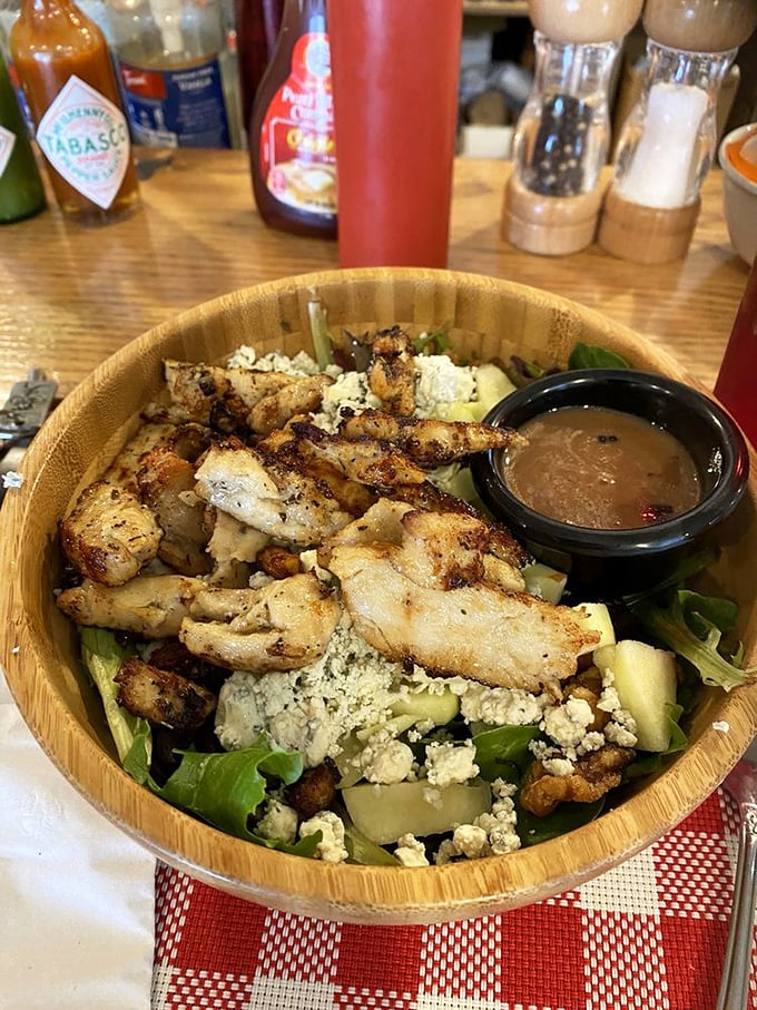 This salad bowl proves healthy eating needn't be punishment&mdash;grilled chicken, fresh greens, and goat cheese create a virtuous indulgence worth savoring.