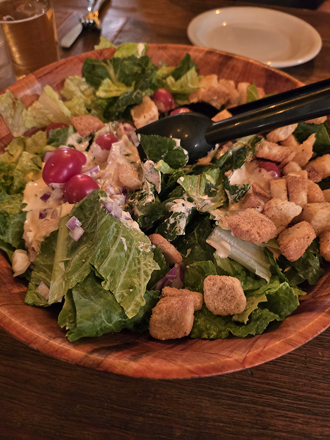 Even the salads mean business here. Fresh greens, vibrant vegetables, and homemade croutons prove that side dishes deserve respect too.