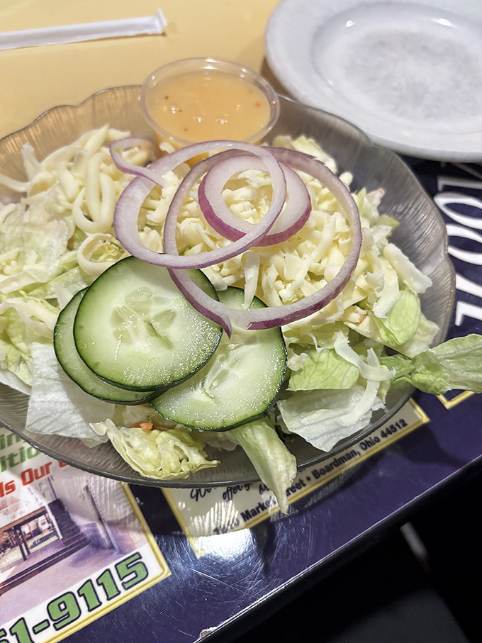 A simple house salad becomes something special with fresh ingredients and that dressing they've probably been making the same way for decades.