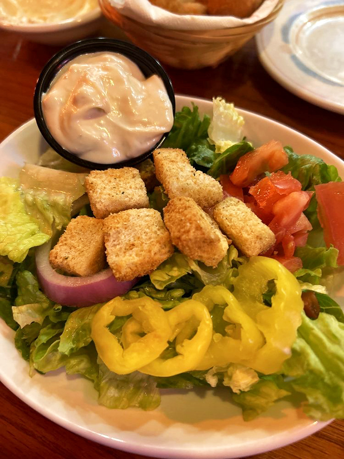 A garden-fresh salad that doesn't apologize for being the opening act to seafood stardom &ndash; crisp, colorful, and dressed to impress.