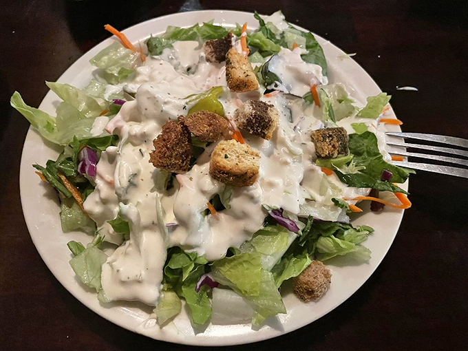 A proper steakhouse salad knows its role: to provide the illusion of virtue before the glorious excess that follows.