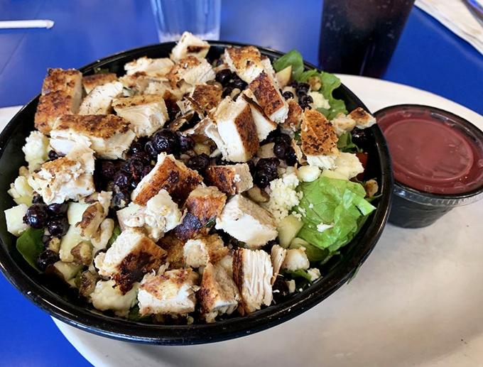 A symphony of textures&mdash;grilled chicken, dried berries, and crunchy nuts atop fresh greens. Proof that Betty's isn't just about the sweet stuff.