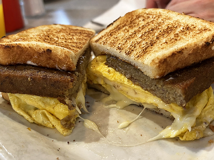 This breakfast sandwich means business&mdash;golden egg and melted cheese between perfectly grilled bread. Simple pleasures are often the most satisfying.