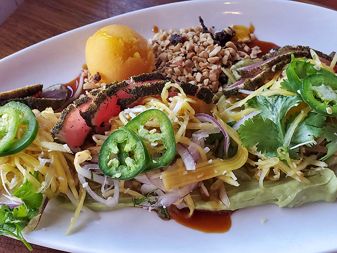 Rare tuna nestled among vibrant vegetables and grains&mdash;proof that healthy eating and indulgence aren't mutually exclusive concepts.