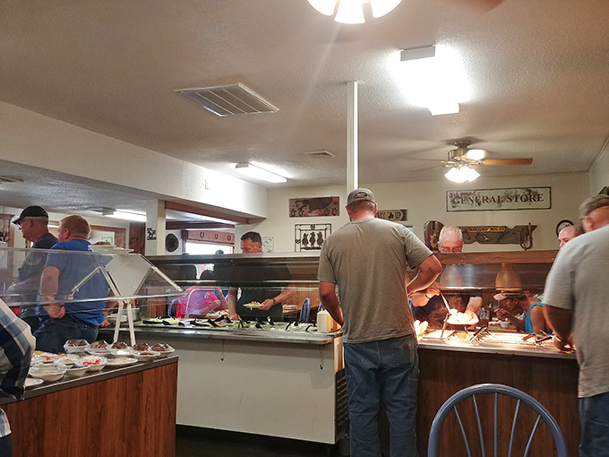 The buffet line – where decisions are made, plates are filled, and the only judgment comes from wondering if you can fit just one more roll.