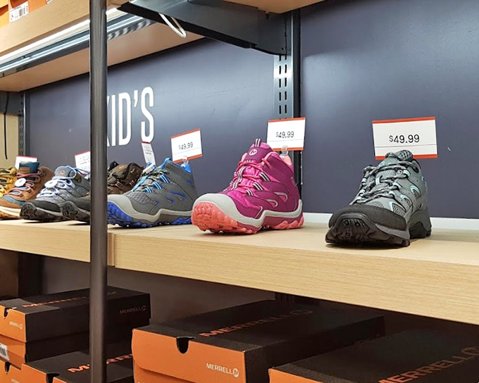 Hiking boots lined up like eager adventurers waiting for their next expedition &ndash; at prices that leave room in the budget for the actual adventure.