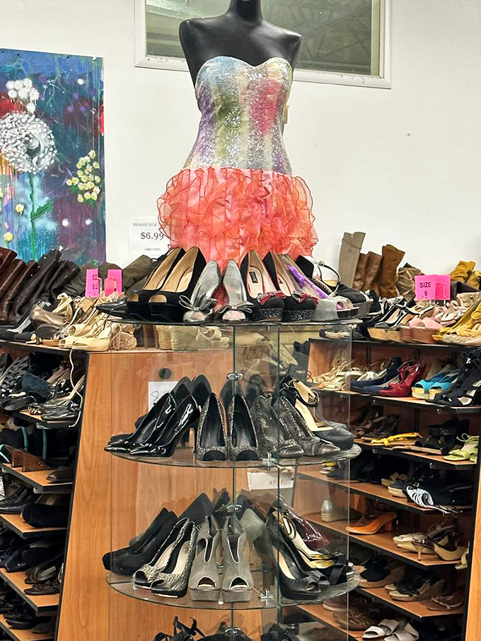 A colorful dress stands sentinel over a shoe empire. Cinderella would have saved herself a lot of trouble with this selection.