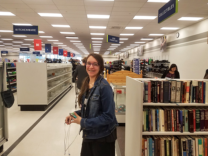 Thrift store explorers navigate the well-organized aisles with the focused determination of archaeologists on the verge of discovery.