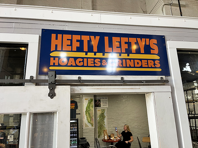 That bold orange and blue sign promises hefty portions and even heftier satisfaction inside these walls.