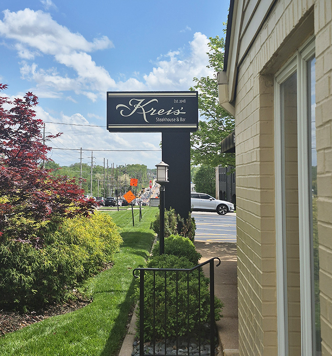 The Kreis' sign stands as a beacon for those seeking serious steak satisfaction. Like a lighthouse guiding hungry ships to safe harbor.