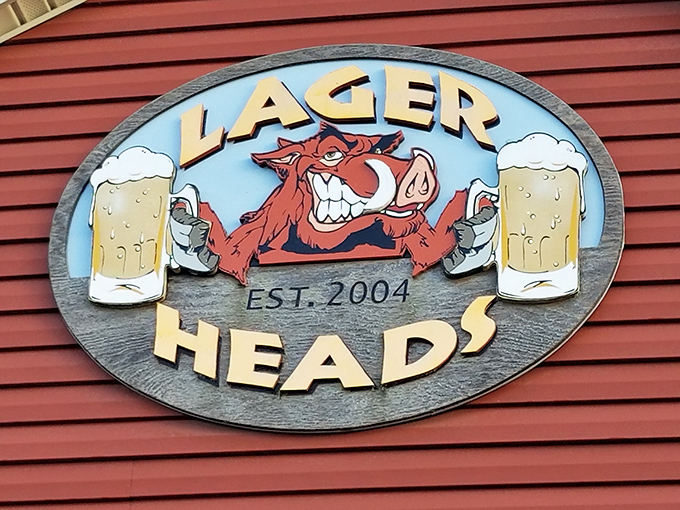 The cartoon boar on their sign, clutching beer mugs with gleeful determination, perfectly captures the spirit of the place.