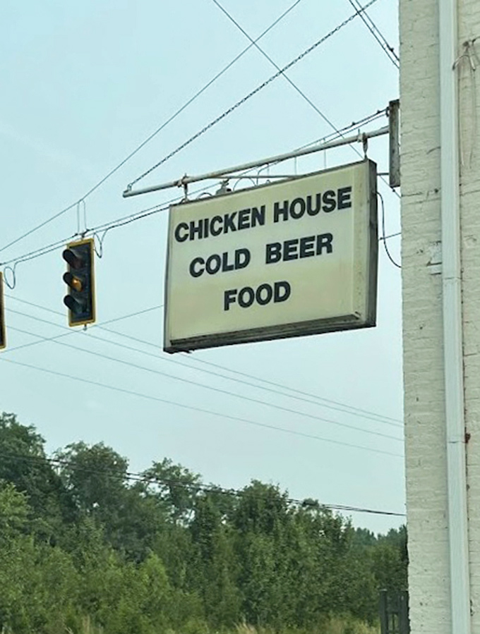 Nothing fancy about this sign – just honest advertising for "Cold Beer" and seriously good food.