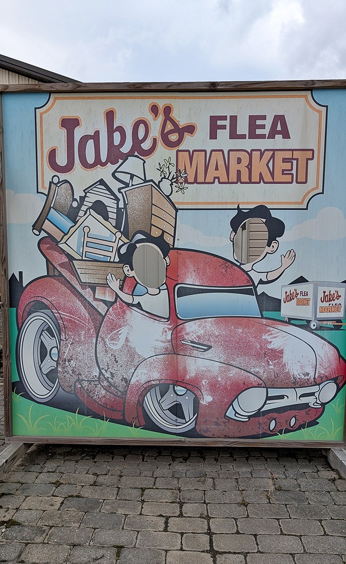 The market's whimsical sign perfectly captures the spirit of the place&mdash;a cartoon car overflowing with treasures, much like your trunk will be.